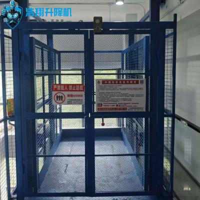 China 6m Blue Warehouse Elevator Lift 20000kgs Warehouse Goods Lift Self Customized for sale