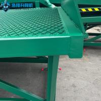 China 20T-12M Customized Green Loading And Unloading Goods Hydraulic Dock Ramp Product Details for sale