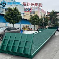 China 20T-12M Customized Green Loading And Unloading Goods Hydraulic Dock Ramp Product Details for sale