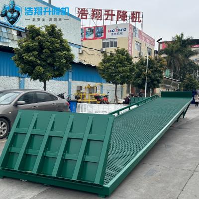 China 20T-12M Customized Green Loading And Unloading Goods Hydraulic Dock Ramp Product Details for sale