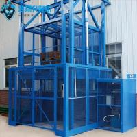 China 10m High Blue 500kg-20000kg Industrial Indoor Goods Lift Hydraulic Cargo Elevator for sale