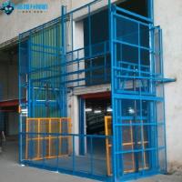 China 6m High Blue 500kg-20000kg Industrial Indoor Goods Lift Hydraulic Cargo Elevator for sale