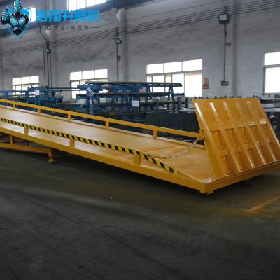 China Yellow Loading And Unloading Goods Hydraulic Dock Ramp For Wrkshop for sale