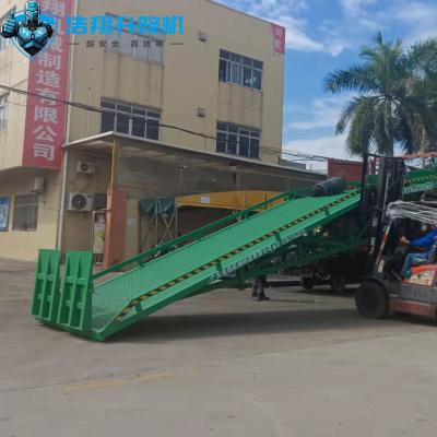 China 15 Tons Green Mobile Dock Ramp Warehouse Portable Truck Loading Ramp for sale