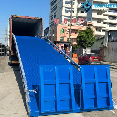 China 10T-10M Customized Blue Loading And Unloading Goods Hydraulic Dock Ramp Product Details for sale