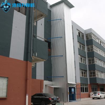 China 10m High 500kg-20000kg Industrial Outdoor Goods Lift Hydraulic Cargo Elevator for sale