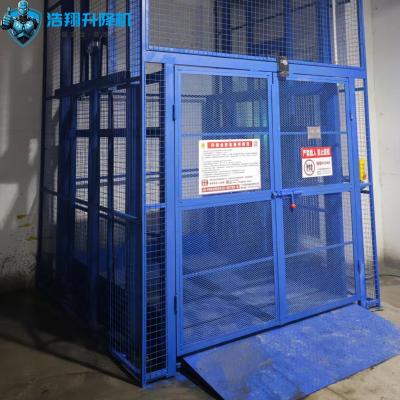 China 6m High 500kg-20000kg Blue Industrial Indoor Goods Lift Hydraulic Cargo Elevator for sale