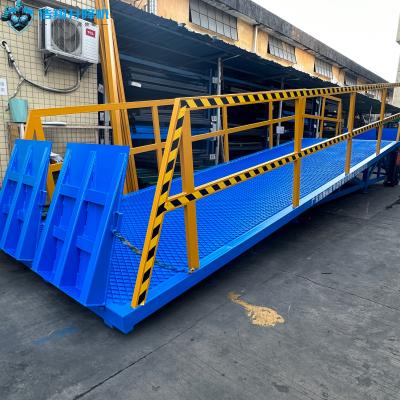 China High Guardrail Loading And Unloading Goods Hydraulic Dock Ramp For Factory for sale