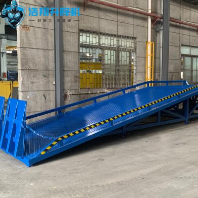 China Custom Blue Loading And Unloading Goods Manual Dock Ramp For Warehouse for sale