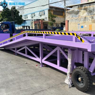 China Customized Purple Loading And Unloading Goods Manual Dock Ramp Energy Efficiency for sale