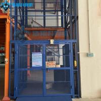 China 6m High Customizable Blue 500kg-20000kg Industrial Indoor Hydraulic Freight Lift for sale