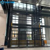 China 4 Fold Door And Counterweight Door 8 Tons 10M High Large Capacity Industrial Indoor Hydraulic Freight Lift for sale
