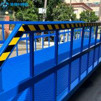 China High Guardrail Large Load Capacity Standard Blue Hydraulic Dock Ramp For Connecting Forklifts And Trucks for sale