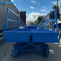 China High Guardrail Large Load Capacity Standard Blue Hydraulic Dock Ramp For Connecting Forklifts And Trucks for sale