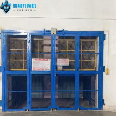 China Four-fold Door And Diamond Mesh Protection Net 2 Tons 6M High Customized  500kg-20000kg Large Industrial Indoor Hydraulic Freight Elevetor for sale