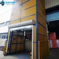 China Customized Yellow Perforated Metal Protection Net Rolling Door Indoor Platform Warehouse Cargo Elevator Steel Heavy Loads Hydraulic Lifts for sale