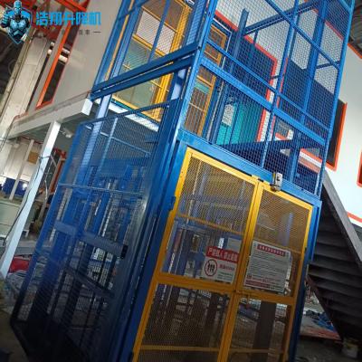 China Double Door Two Floors 6 m Warehouse Cargo Elevator Steel Heavy Loads Hydraulic Lifts for sale
