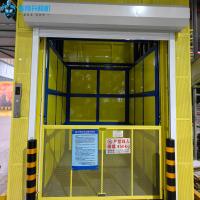 China Perforated Metal Protective Net And Counterweight And Rolling Door 5 m Warehouse Cargo Elevator Steel Indoor Hydraulic Lifts Loading Heavy Freight for sale