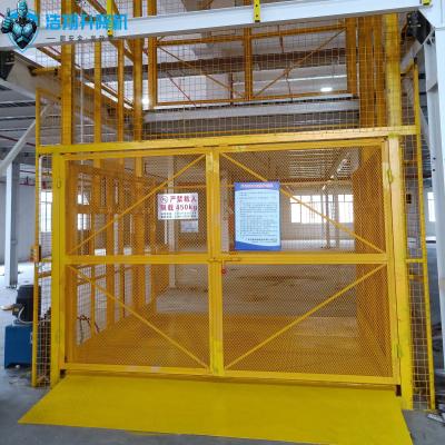 China Customized Yellow 2 Floors 5M Warehouse Cargo Hydraulic Elevator Steel Indoor Loading And Unloading Heavy Freight for sale