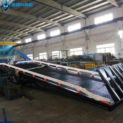 China 10T-10M Customized Black Portable Manual Dock Ramp Connecting The Trucks And Forklifts for sale