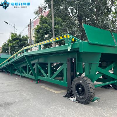 China Large Load Capacity Customized Green Portable Hydraulic Dock Ramp For Forklifts Load And Unload Cargo for sale