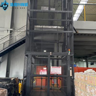 China Customized Black Two Floors 2T 5M Hydraulic Guide Rail Elevator For Loading And Unloading Goods for sale