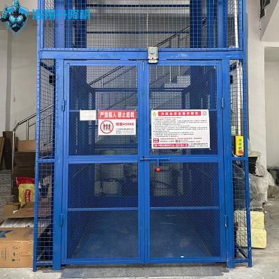 China Standard Blue Two Floors 2T 6M Double Door Indoor Hydraulic Guide Rail Elevator For Loading And Unloading Goods In Factory for sale
