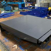 China Adjustable Height Dock Leveler 5t-18t Non-Slip Cargo Dock Transition Plate Hydraulic truck loading for sale