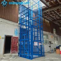 China Customized 2-Ton 6M Hydraulic Freight Elevator with Four-fold Door & Diamond Mesh for Industrial Indoor for sale