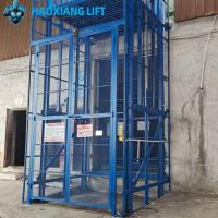China Customized 2-Ton 6M Hydraulic Freight Elevator with Four-fold Door & Diamond Mesh for Industrial Indoor for sale