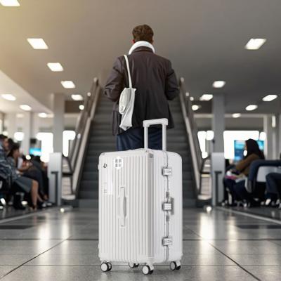 China Unisex Custom Large Capacity PC Trolley Luggage Set 20/24/26/28 Inch Intelligent Aluminum Frame Spinner Caster Durable Business for sale