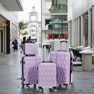 China Unisex Luxury 4-Wheel Spinner Luggage Suitcase 4-Piece Durable ABS Travel Bag Set Zipper TSA Lock Simple Stylish Metallic for sale