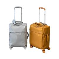 China Ultra Lightweight Nylon Carry-On Luggage Waterproof Non-Woven Suitcase with Universal Spinner Wheels Unisex Portable Design for sale