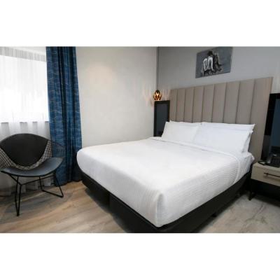 China Sadie Best Western Hotel Liquidates Wholesale Wood Furniture for Guest Rooms Wardrobe Bed Base & Sofa for sale