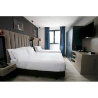 China Sadie Best Western Hotel Liquidates Wholesale Wood Furniture for Guest Rooms Wardrobe Bed Base & Sofa for sale