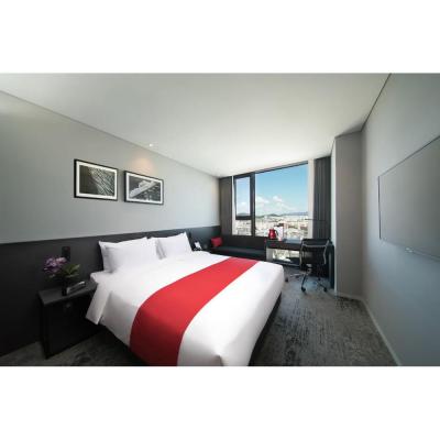 China Hot Sell Best Western Plus Commercial Modern Style Hotel Bedroom Suite 3 Star Wood Hotel Nordic Style Elegant Hotel Furniture for sale