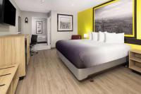 China Hot Sell Super 8 by Wyndham Stylish Budget Hotel Bed Frame Headboard Guestroom Furniture Business Class Hotel Bedroom Sets for sale