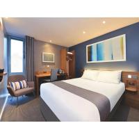 China Modern Hotel Bedroom Furniture Travelodge Wholesale Liquidation Wardrobe Bed Base Headboard Chairs Sofa Panel for Guest Room for sale