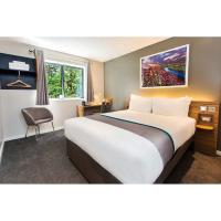 China Modern Hotel Bedroom Furniture Travelodge Wholesale Liquidation Wardrobe Bed Base Headboard Chairs Sofa Panel for Guest Room for sale