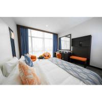 China OEM/ODM Wyndham Ramada Inn Encore High Quality Deluxe Queen Hotel Bedroom Set Modern Wood Design for Business Hotel Furniture for sale