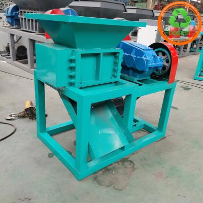China 7.5kW Multifunctional Twin Roll Rotor Scrap Shredder for PVC HDPE PP PET Recycling for sale