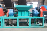 China Double Shaft Shredder For Waste PET Mineral Water Bottle Tree Root With 220V 380V Voltage for sale