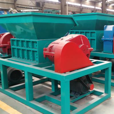 China Double Shaft Multifunctional Shredder for Waste Plastic Bottles and Corrugated Paper for sale