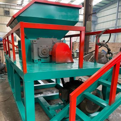 China 1000KG/H Twin Shaft Hob Shredder for Long Service Life Waste Comforter and Mulch Film for sale