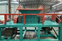 China Multifunctional Twin Shaft Hob Shredder for Old Leather Waste Textile and Fishing Net for sale