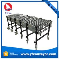 China Heavy Duty Gravity Flexible Steel Skate Wheel Conveyor/Warehouse Loading Unloading Conveyor for sale