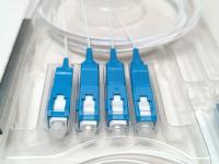China Fiber Optic Divisor 1x4 PLC 0.9mm Steel Tube Splitter SC UPC Connector for sale