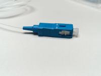 China Fiber Optic Divisor 1x4 PLC 0.9mm Steel Tube Splitter SC UPC Connector for sale