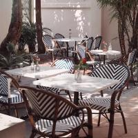 China Hot Sale Cafe Hotel French Style Bistro Rattan Chairs Outside Patio Garden Chair Terrace Restaurant Dining Chair Modern for sale