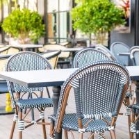 China Hot Sale Cafe Hotel French Style Bistro Rattan Chairs Outside Patio Garden Chair Terrace Restaurant Dining Chair Modern for sale